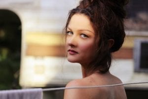 Premiere: Ashley Ray Electrifies on “Pauline” - Guitar Girl Magazine